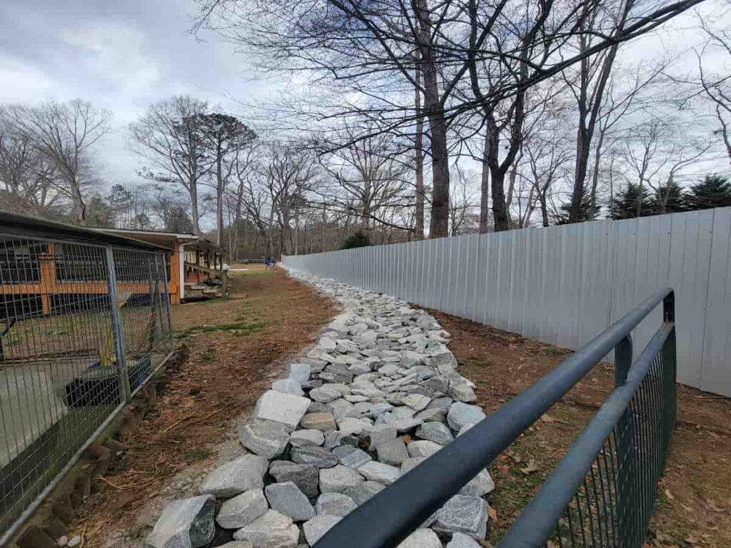 Metal Privacy Fence And Drainage System In Dallas, Ga